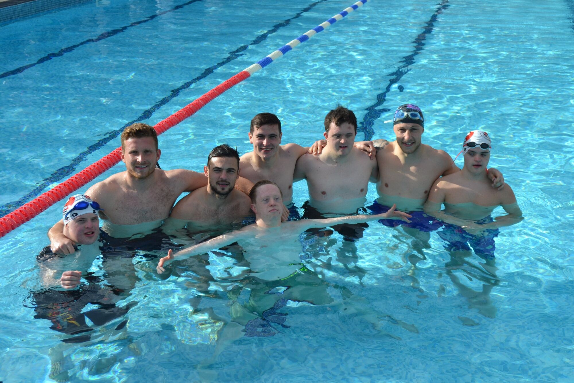 Charlton Athletic players in swimming race against club’s Down syndrome ...